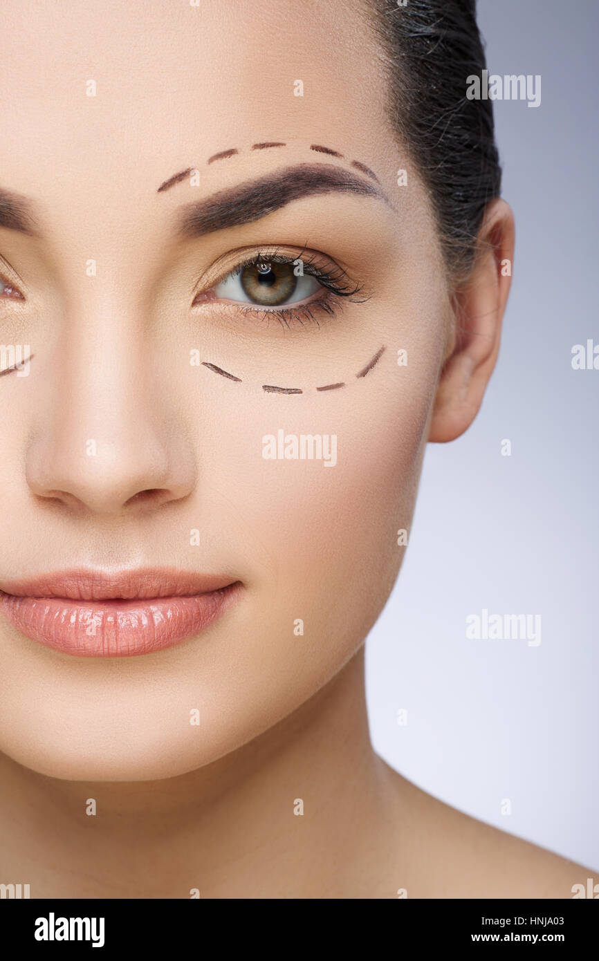Girl with dashed lines around eyes Stock Photo - Alamy