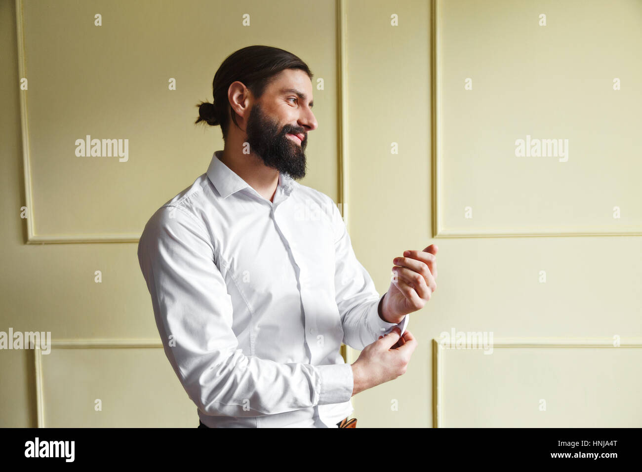 Buttoning cuff hi-res stock photography and images - Alamy