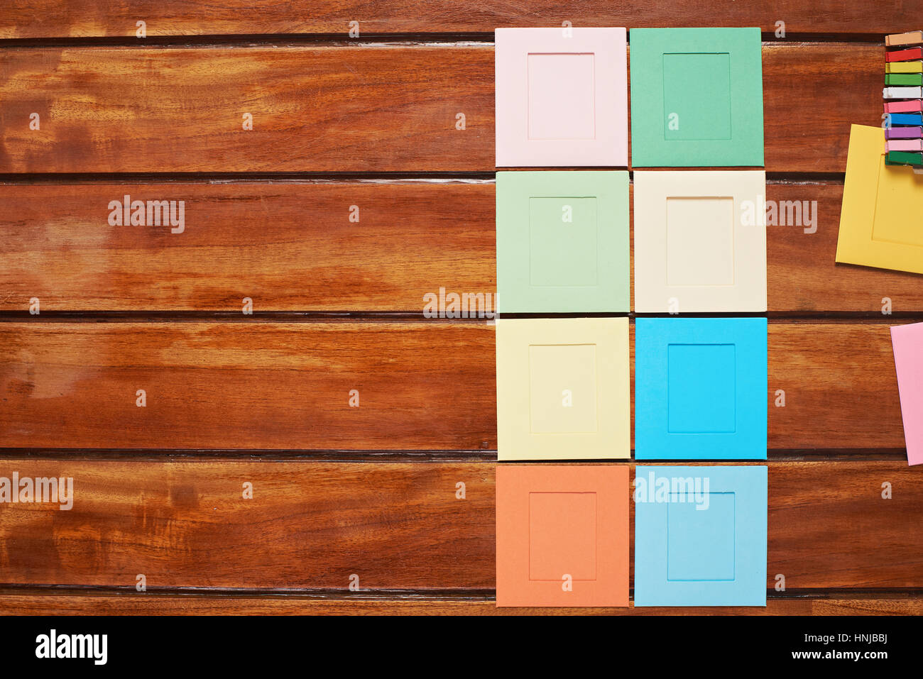 instant camera colorful frame on wooden table view from top Stock Photo ...