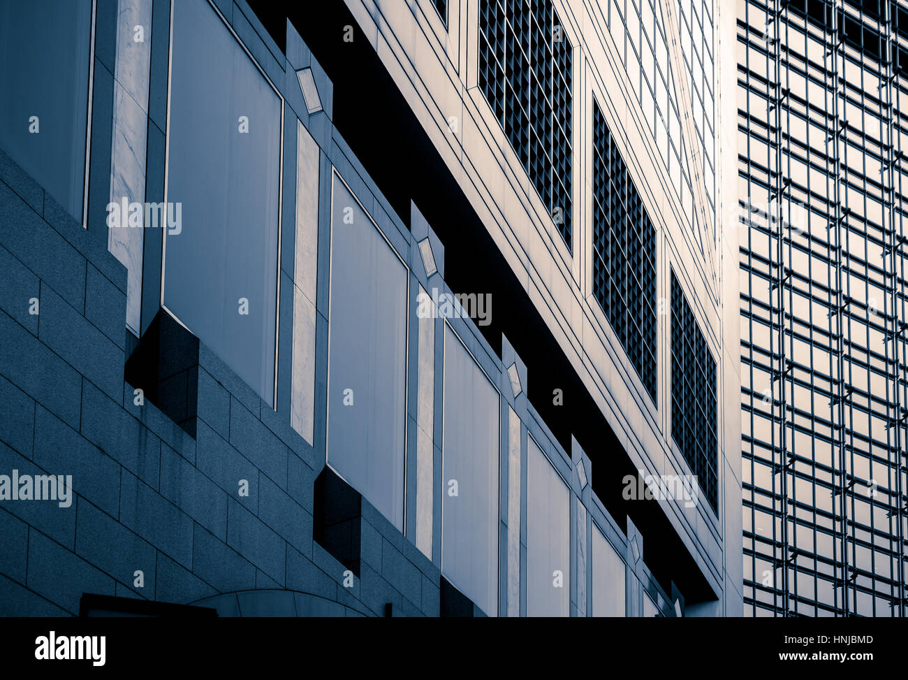 Windows of commercial building in Hong Kong Stock Photo - Alamy