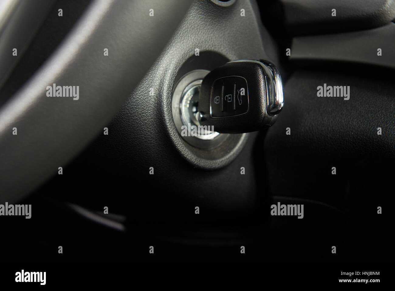 Ignition key of modern car close up. Car key in keyhole Stock Photo - Alamy