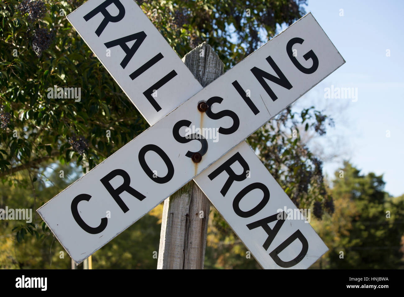 Close up of a railroad crossing sign Stock Photo - Alamy