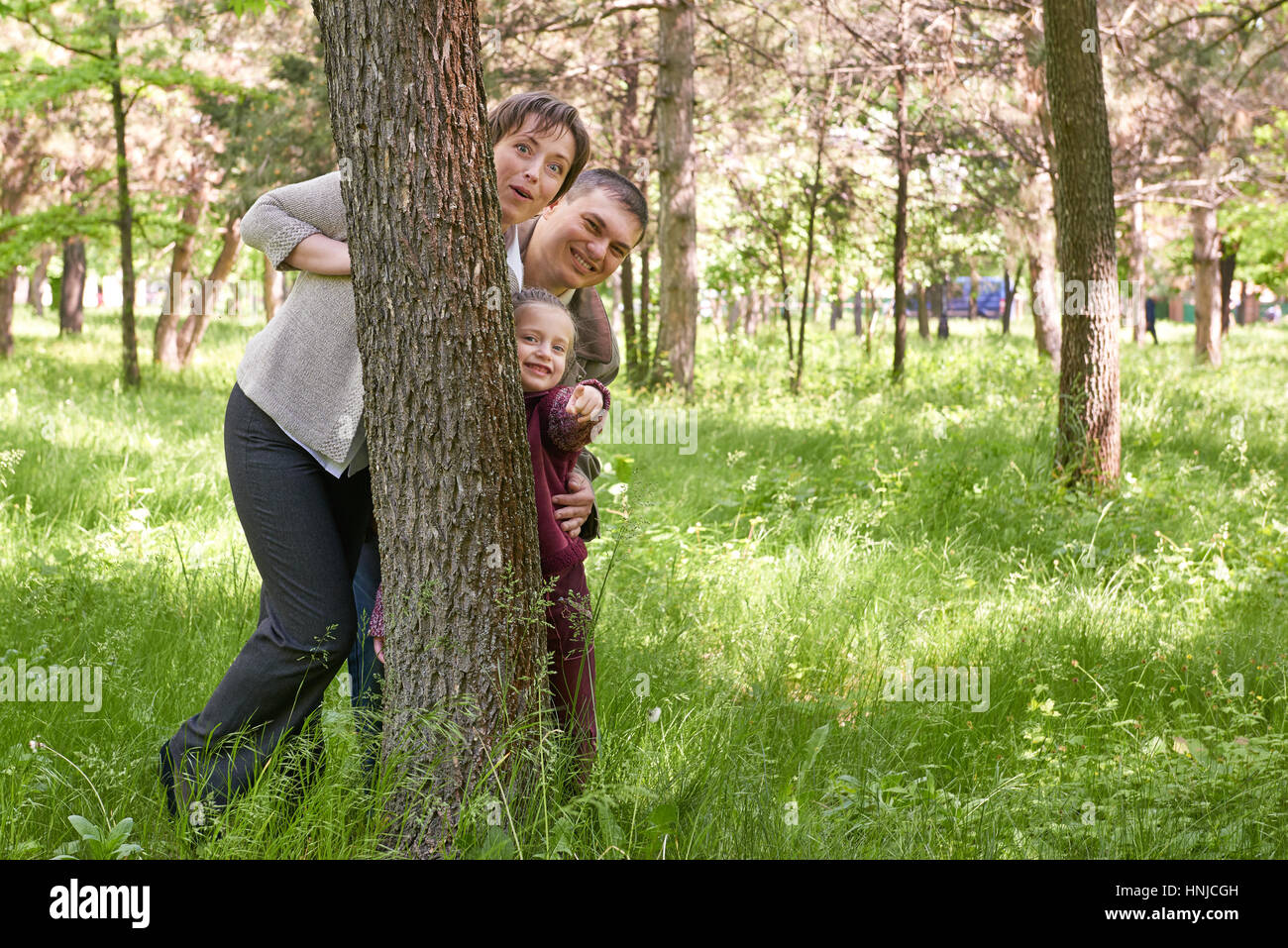 Child hiding behind parent hi-res stock photography and images - Alamy