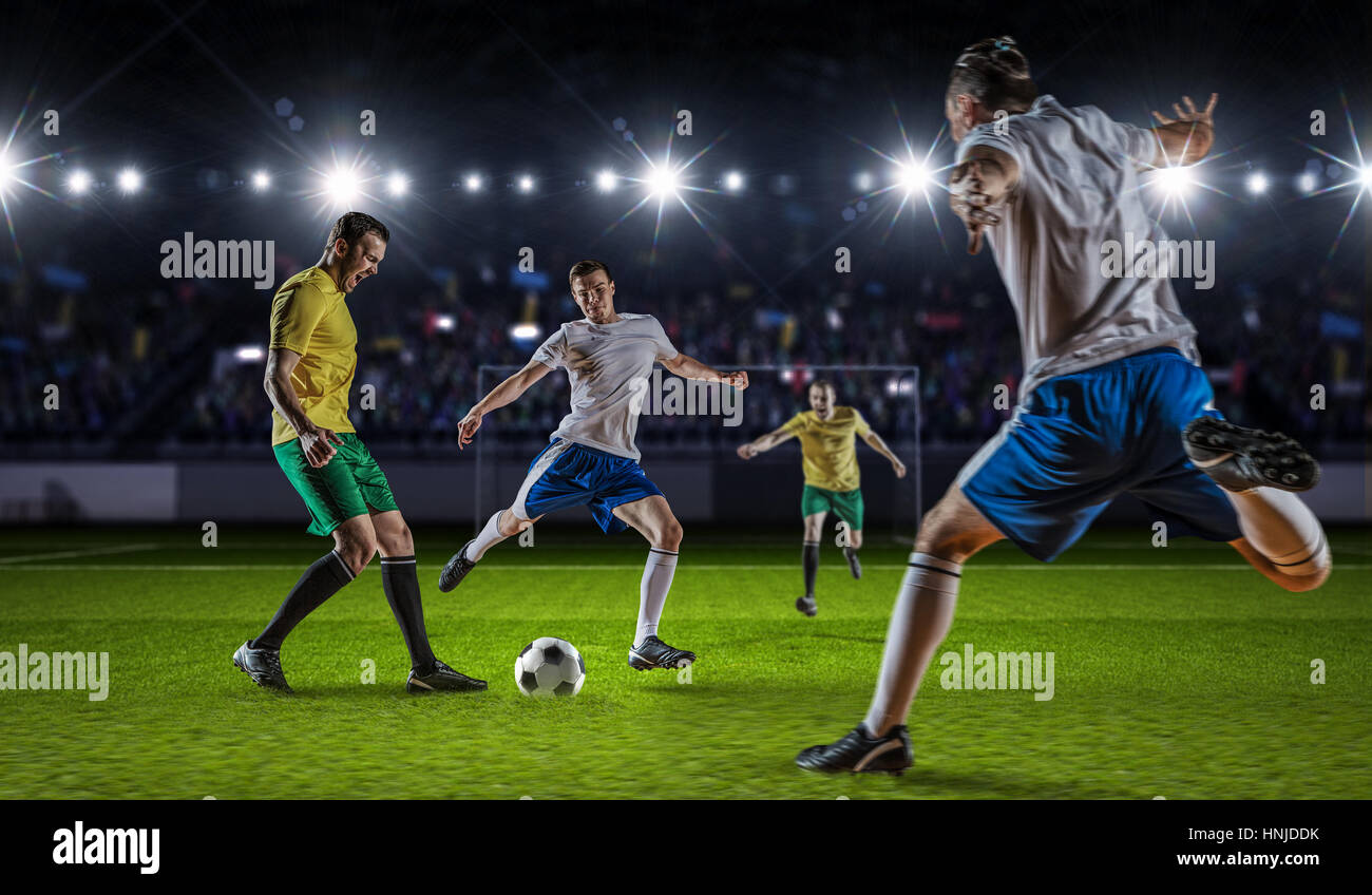 Soccer players in action on stadium fighting for ball. Mixed media ...
