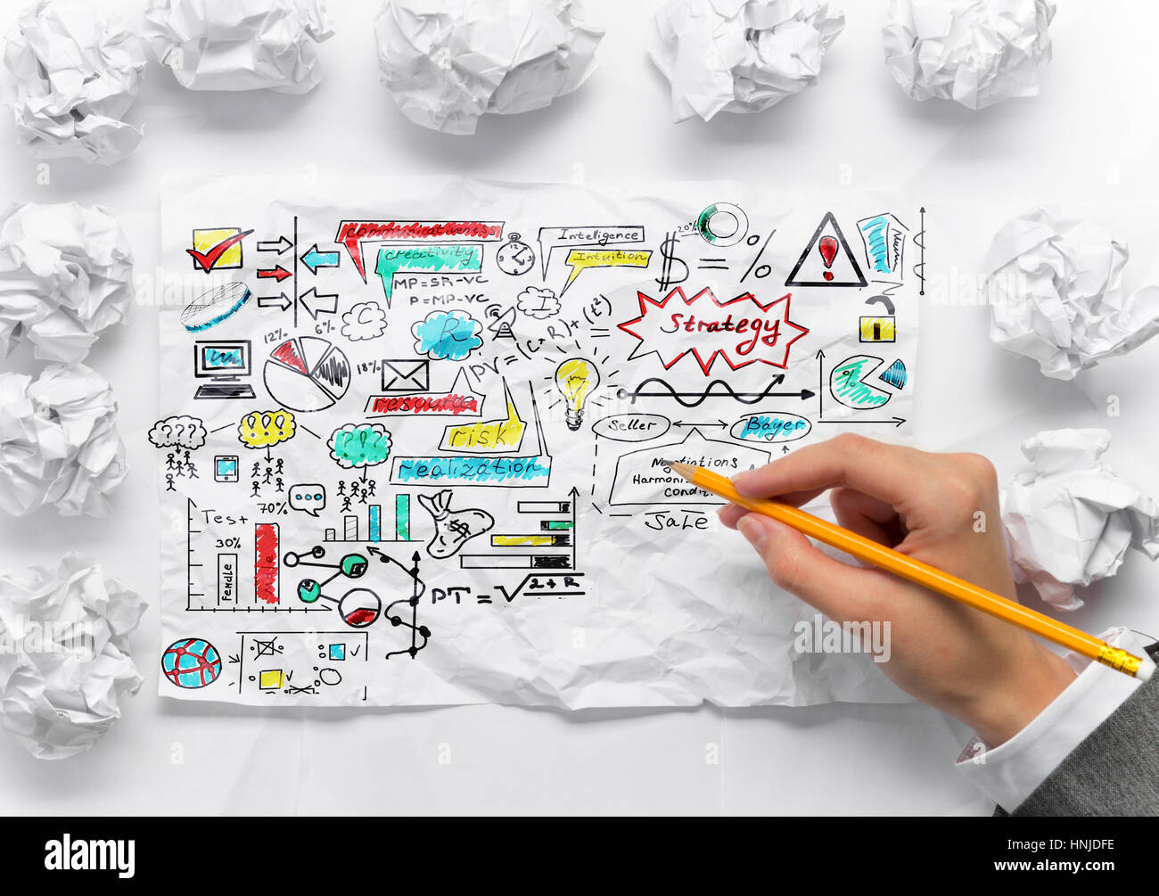 Hand of businesswoman drawing her success plan on crumpled paper Stock ...