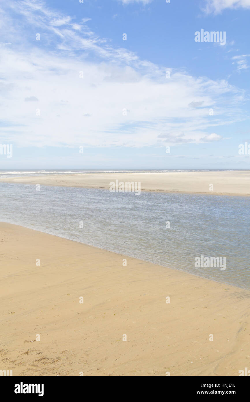 Water channel, Sand and dunes in sunny day at Tavares beach Stock Photo ...