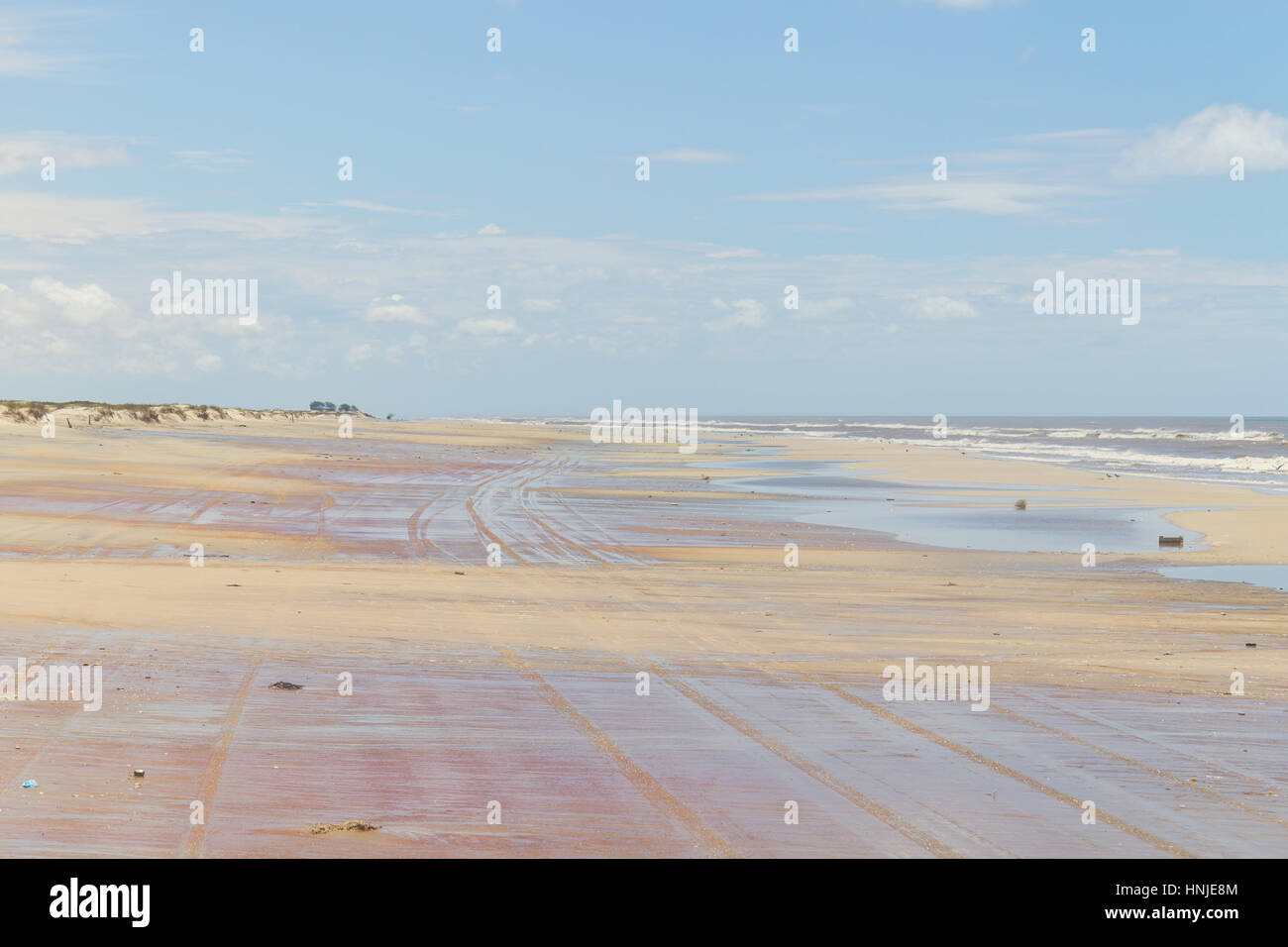 Car wheel mark on the sand at Tavares beach Stock Photo - Alamy