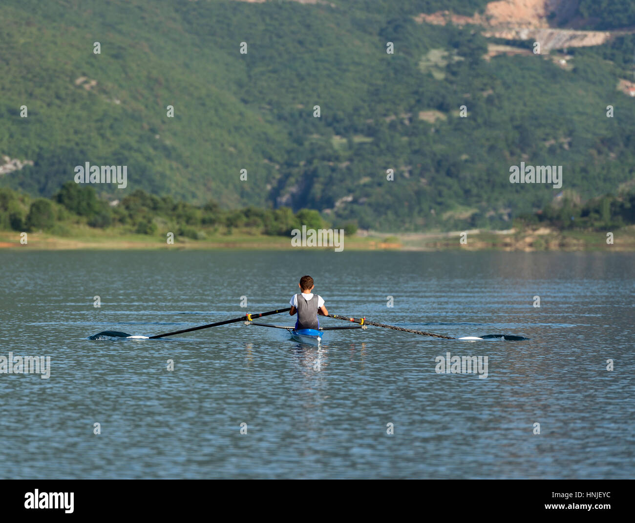 Child in the course of rowing on single Stock Photo - Alamy