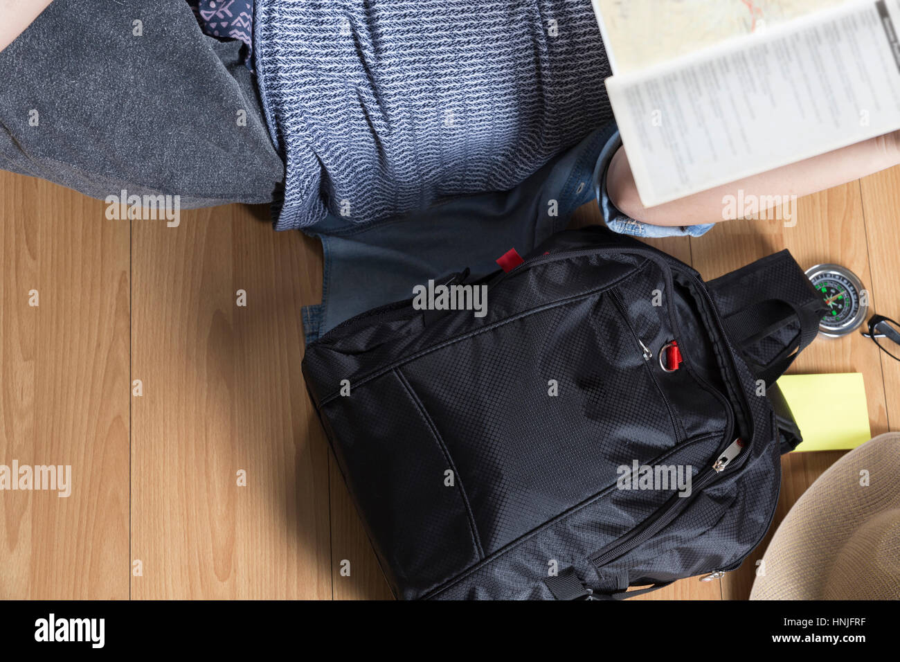 Woman lying with map hi-res stock photography and images - Alamy