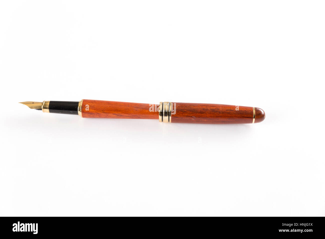 brown vintage fountain pen on white background Stock Photo - Alamy