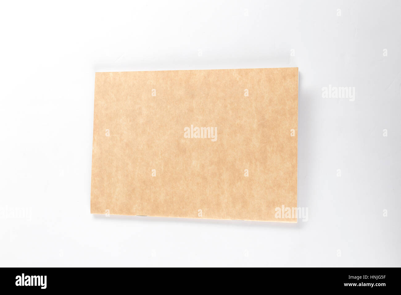 brown notepad notebook on white background Stock Photo - Alamy