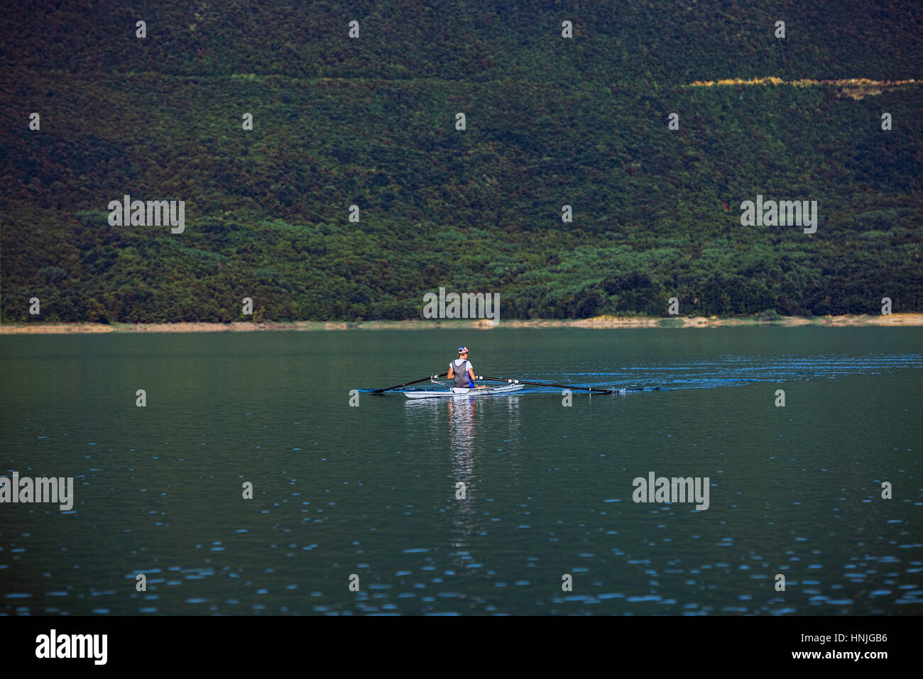single rower at sunrise Stock Photo - Alamy