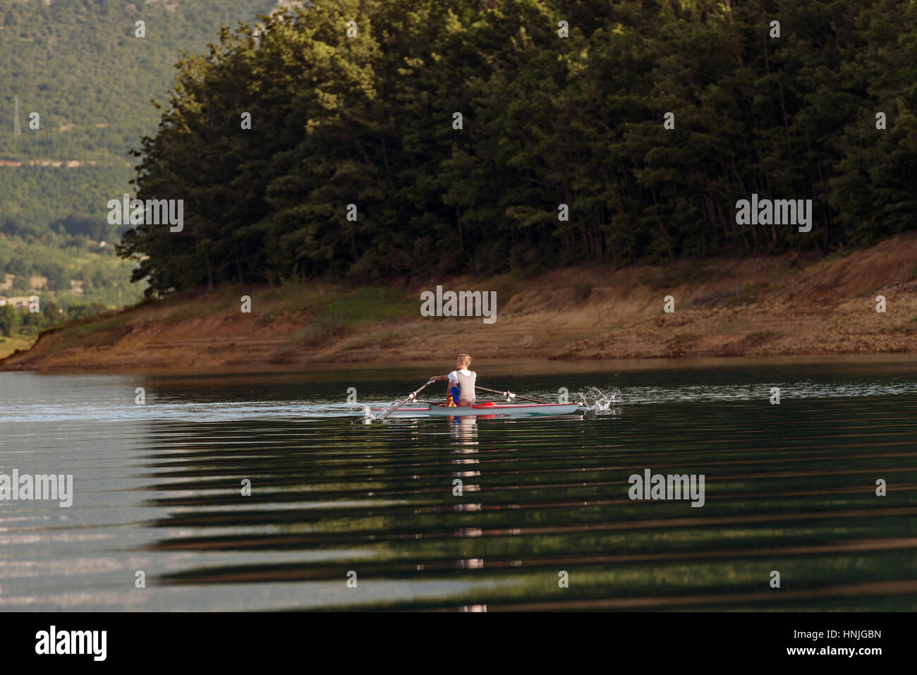 single rower at sunrise Stock Photo - Alamy