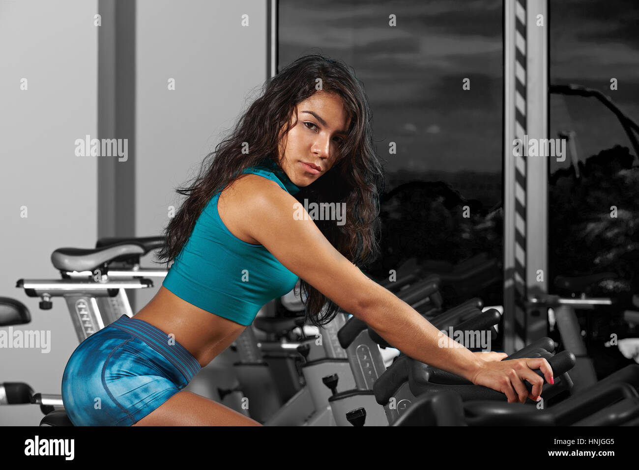 Female training on indoor cycling hi-res stock photography and images ...
