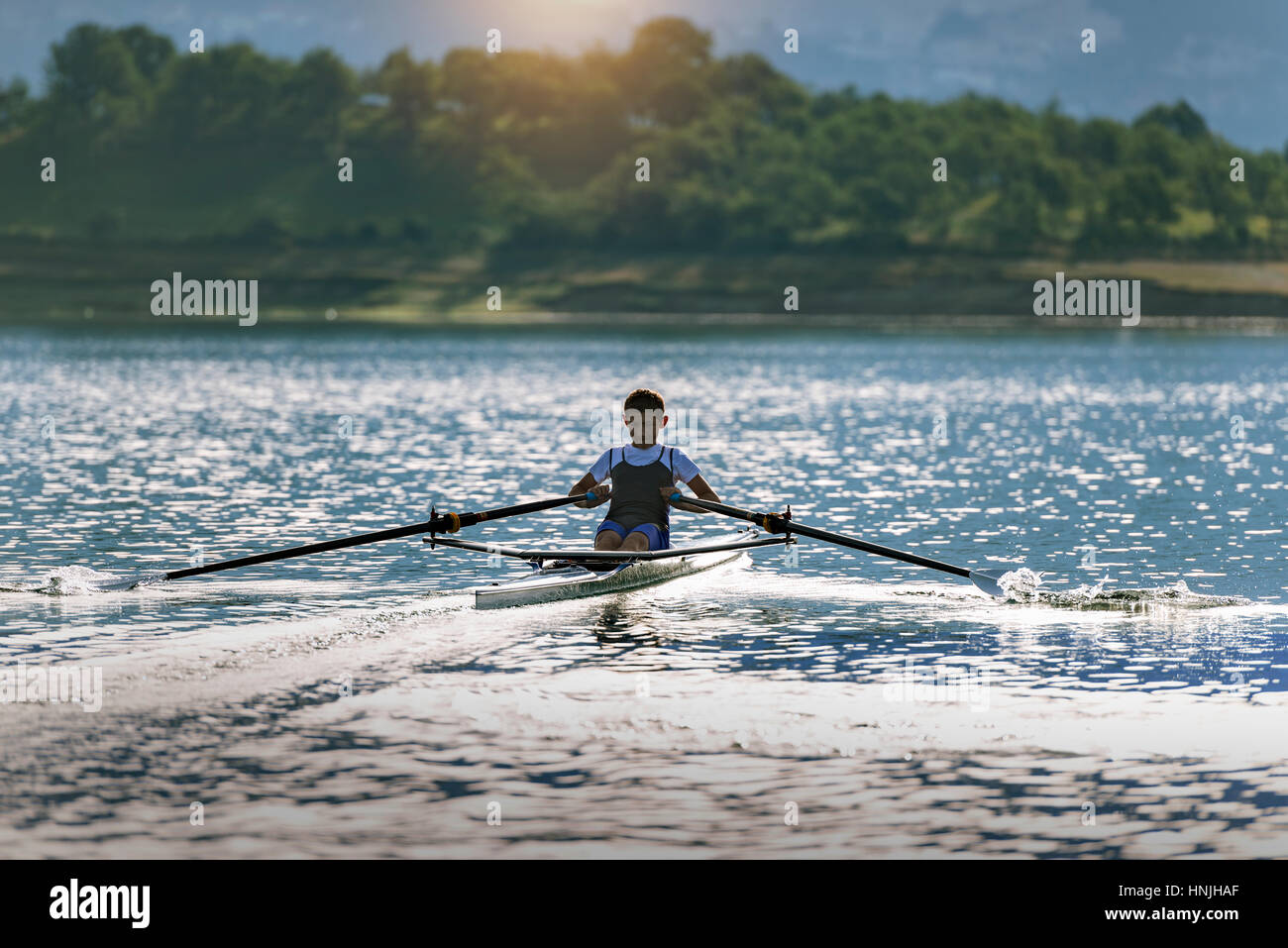 single rower at sunrise Stock Photo - Alamy