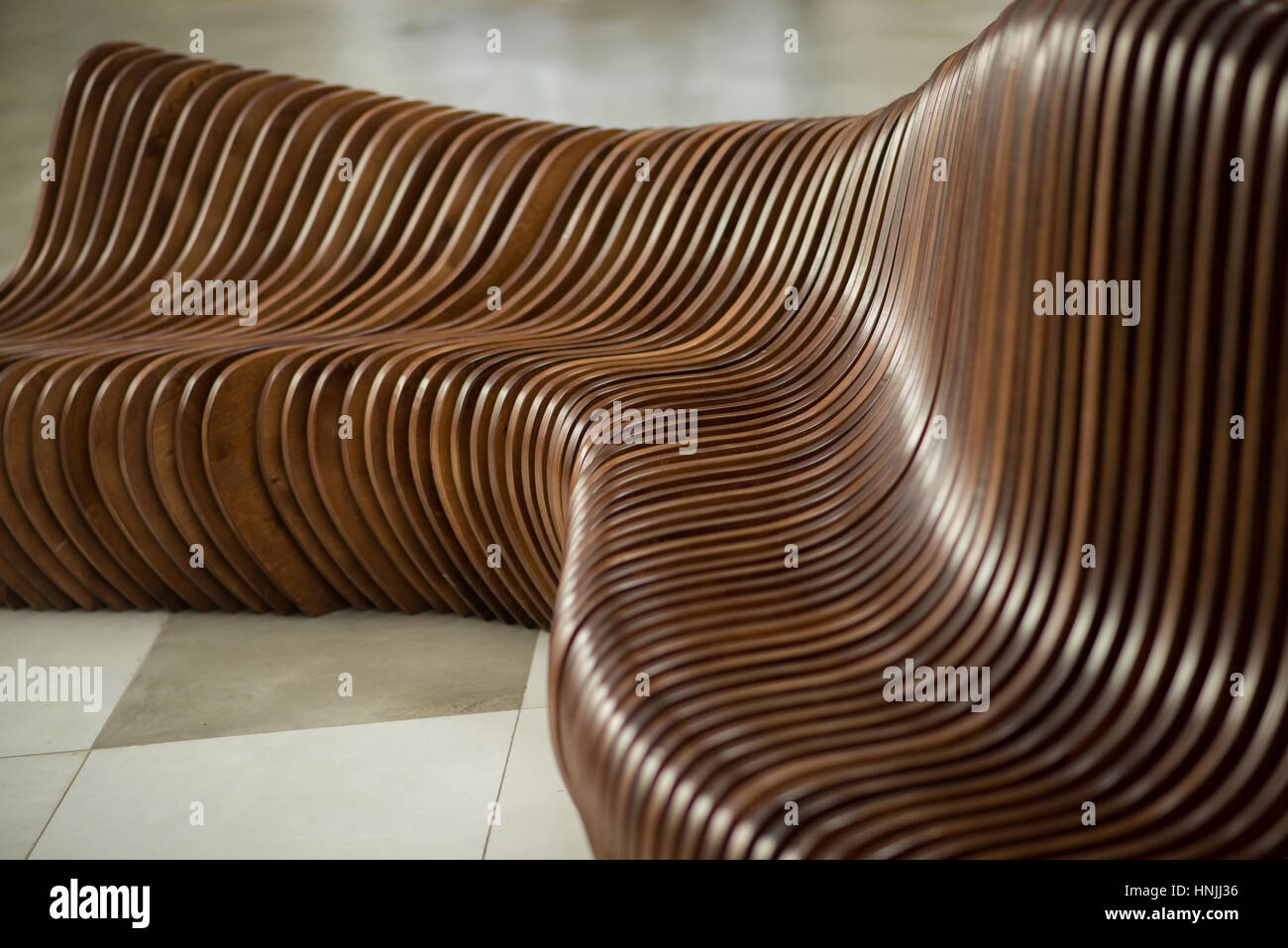 Wooden bench in a shopping mall Stock Photo - Alamy