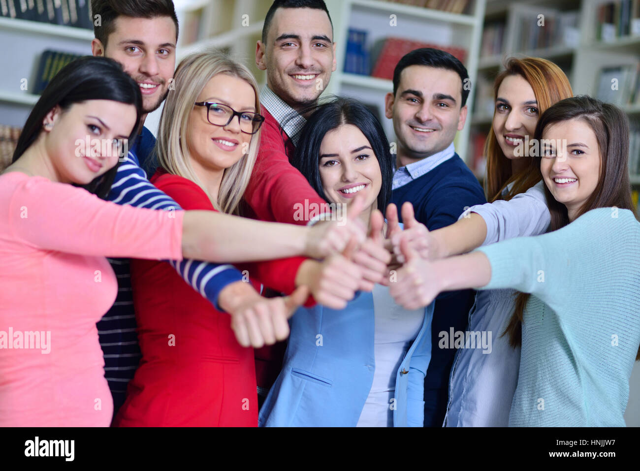 Group of students smiling at camera hi-res stock photography and images ...