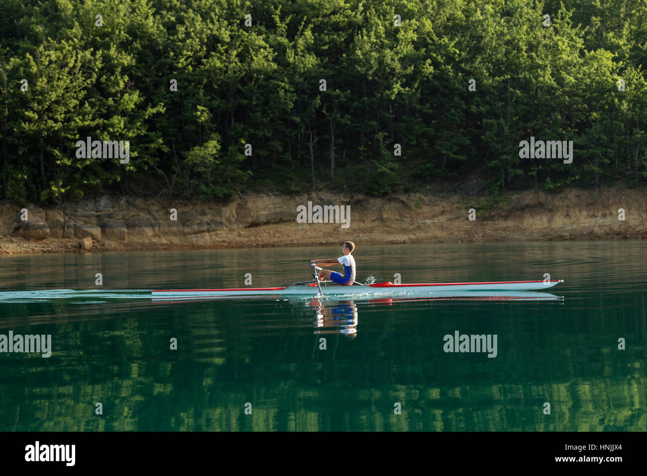 single rower at sunrise Stock Photo - Alamy