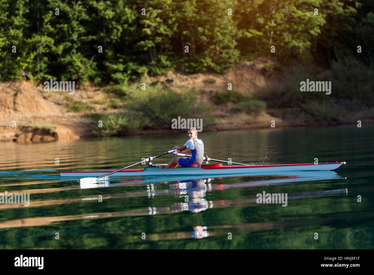single rower at sunrise Stock Photo - Alamy