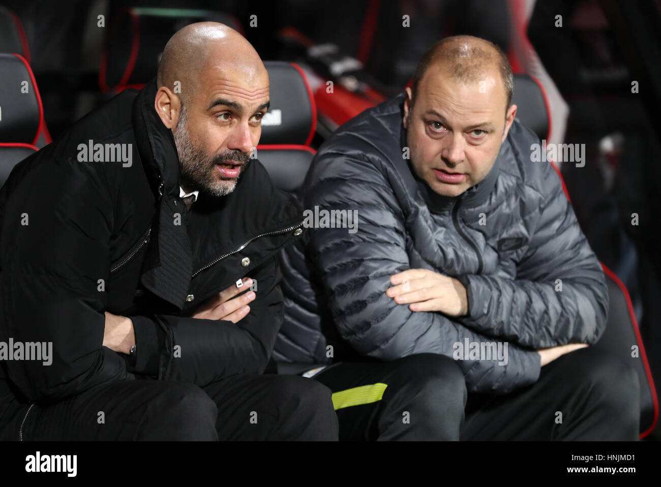 Manchester City manager Pep Guardiola (left) with head of coaching ...