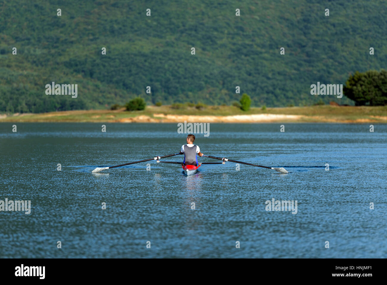 single rower at sunrise Stock Photo - Alamy