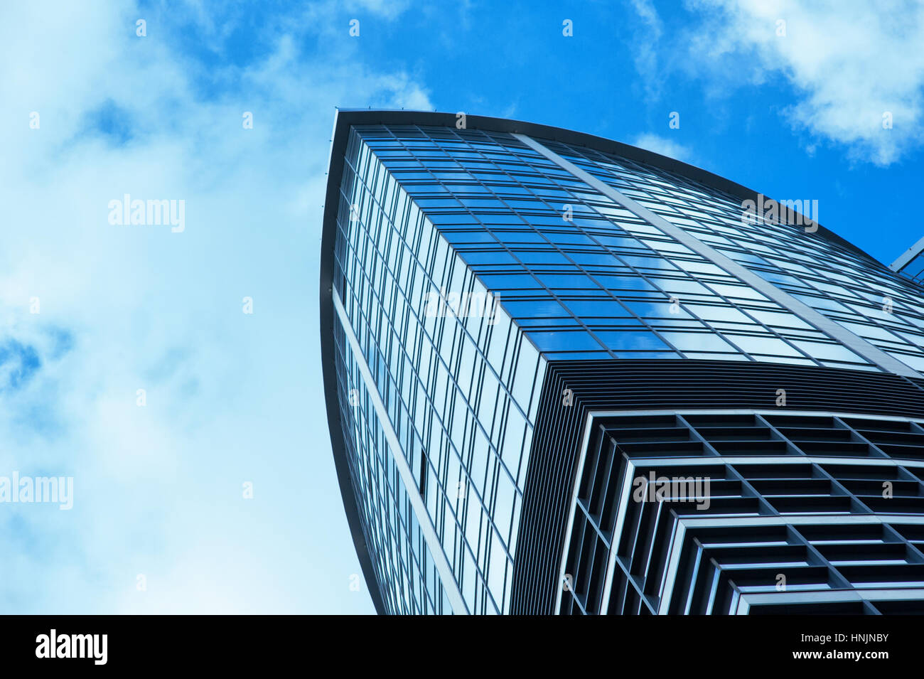 Abstract blue glass office building hi-res stock photography and images ...