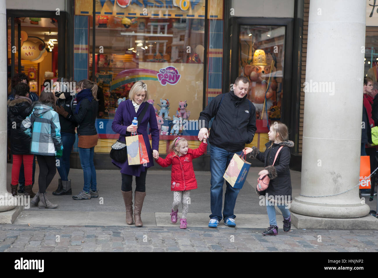 LONDON, UK - APRIL 22, 2016: Happy family with two children out of the ...