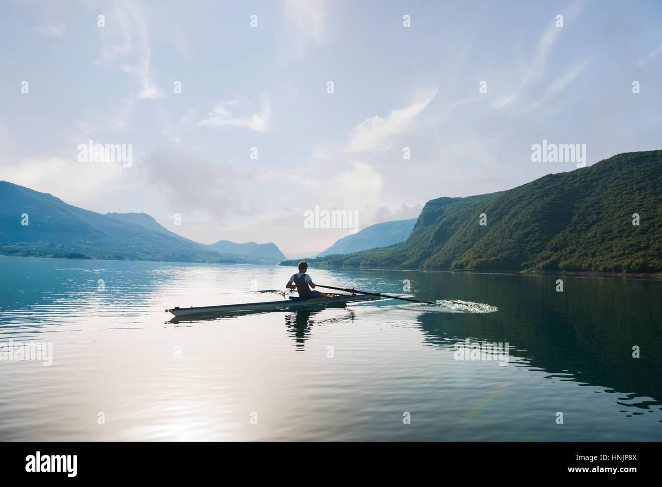 Single scull rowing competitor paddles hi-res stock photography and ...