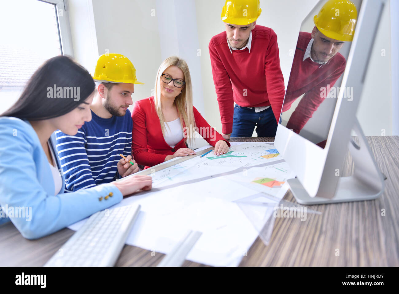 Young team have a Meeting In Architects Office Stock Photo - Alamy