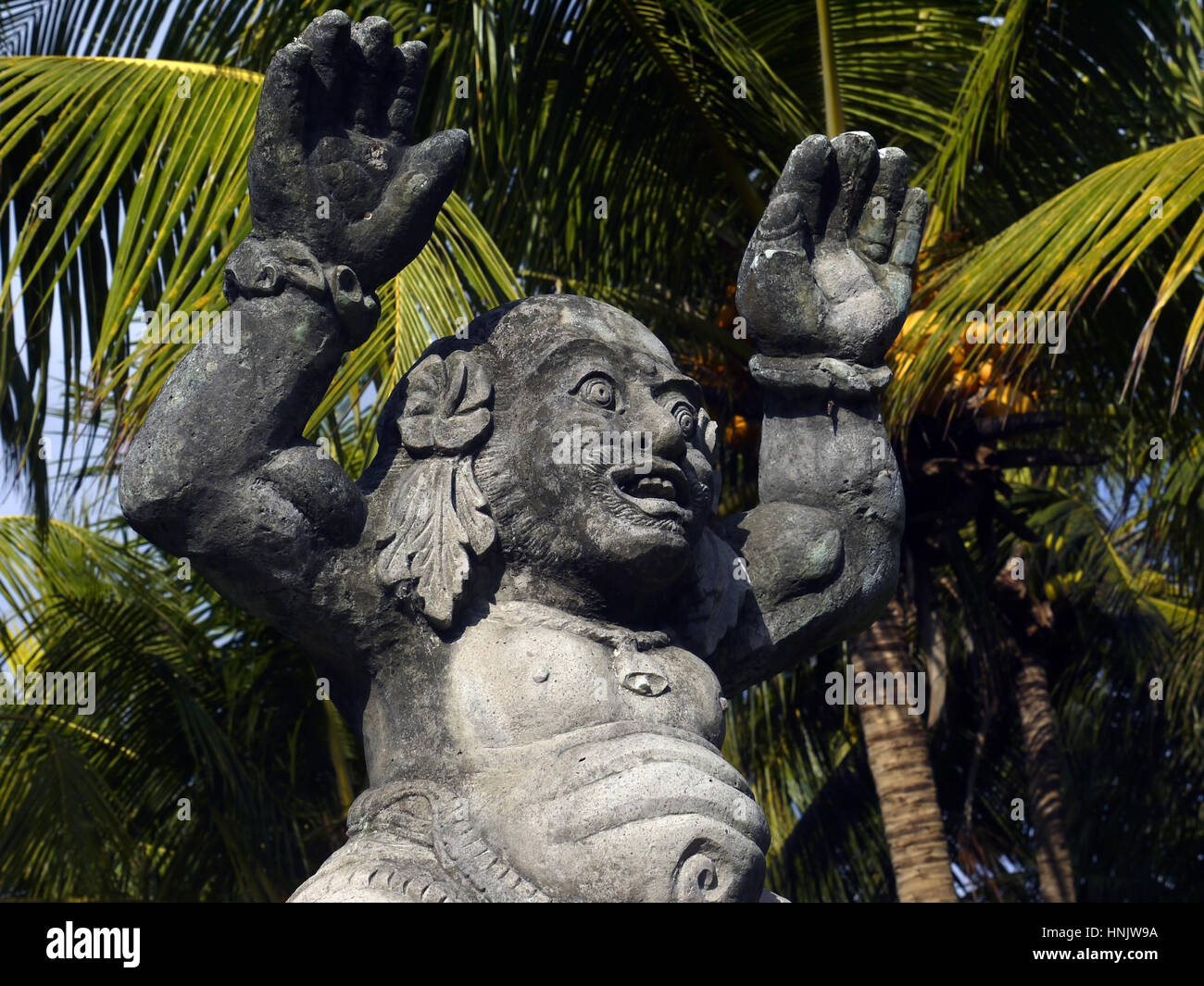 Stone statue in Bali, Indonesia Stock Photo - Alamy
