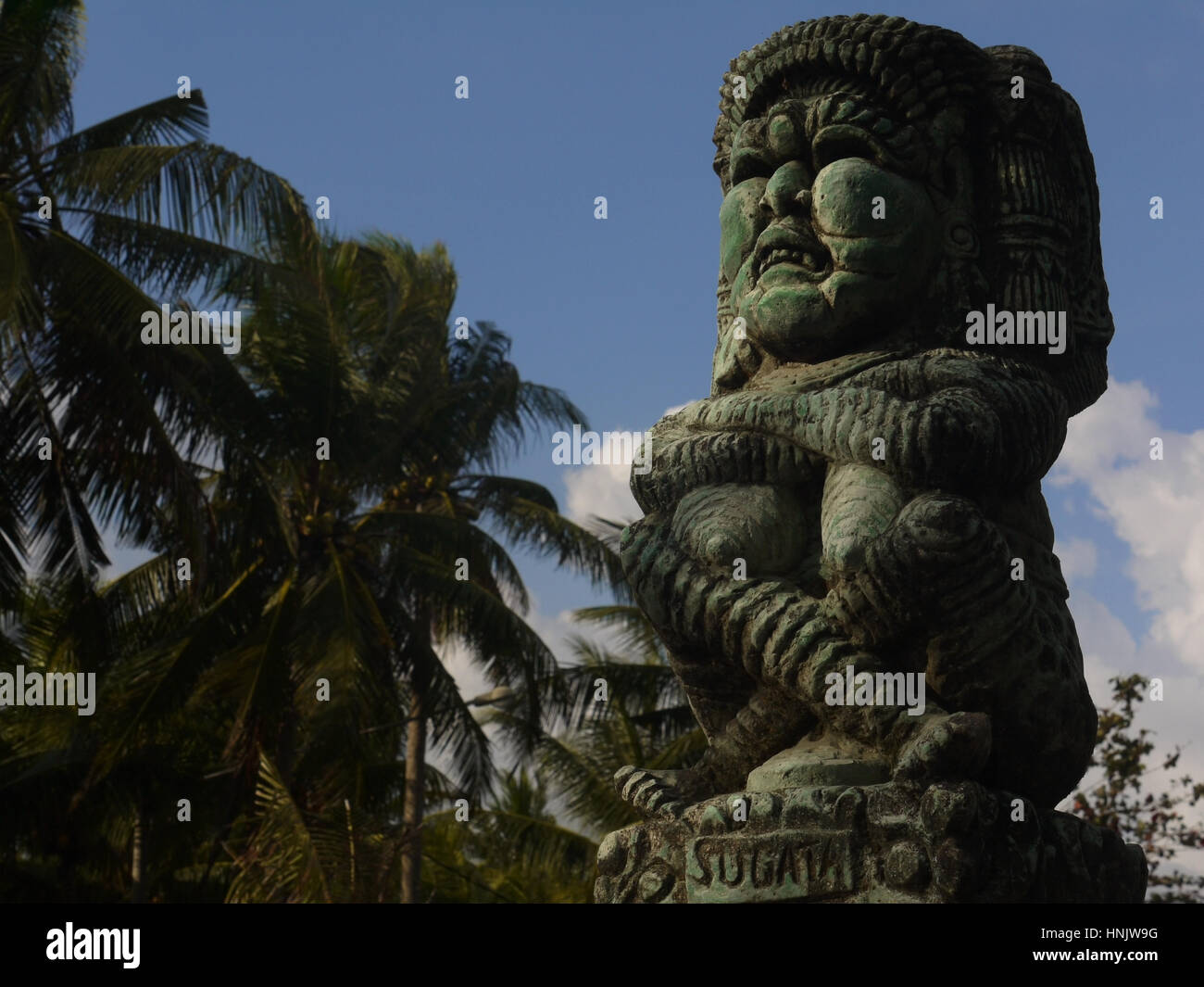 Stone tribal statue in Bali, Indonesia Stock Photo - Alamy