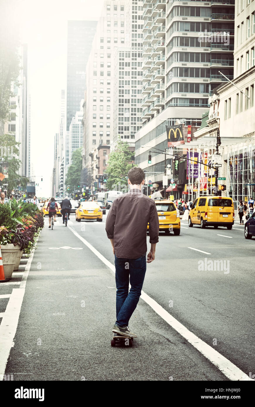 Male teenager with skateboard hi-res stock photography and images - Alamy