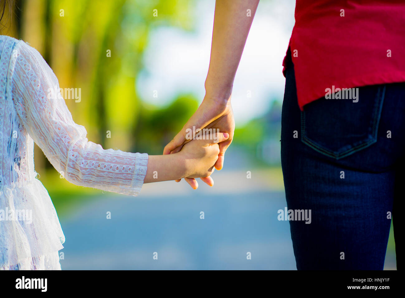 hand in hand Stock Photo - Alamy