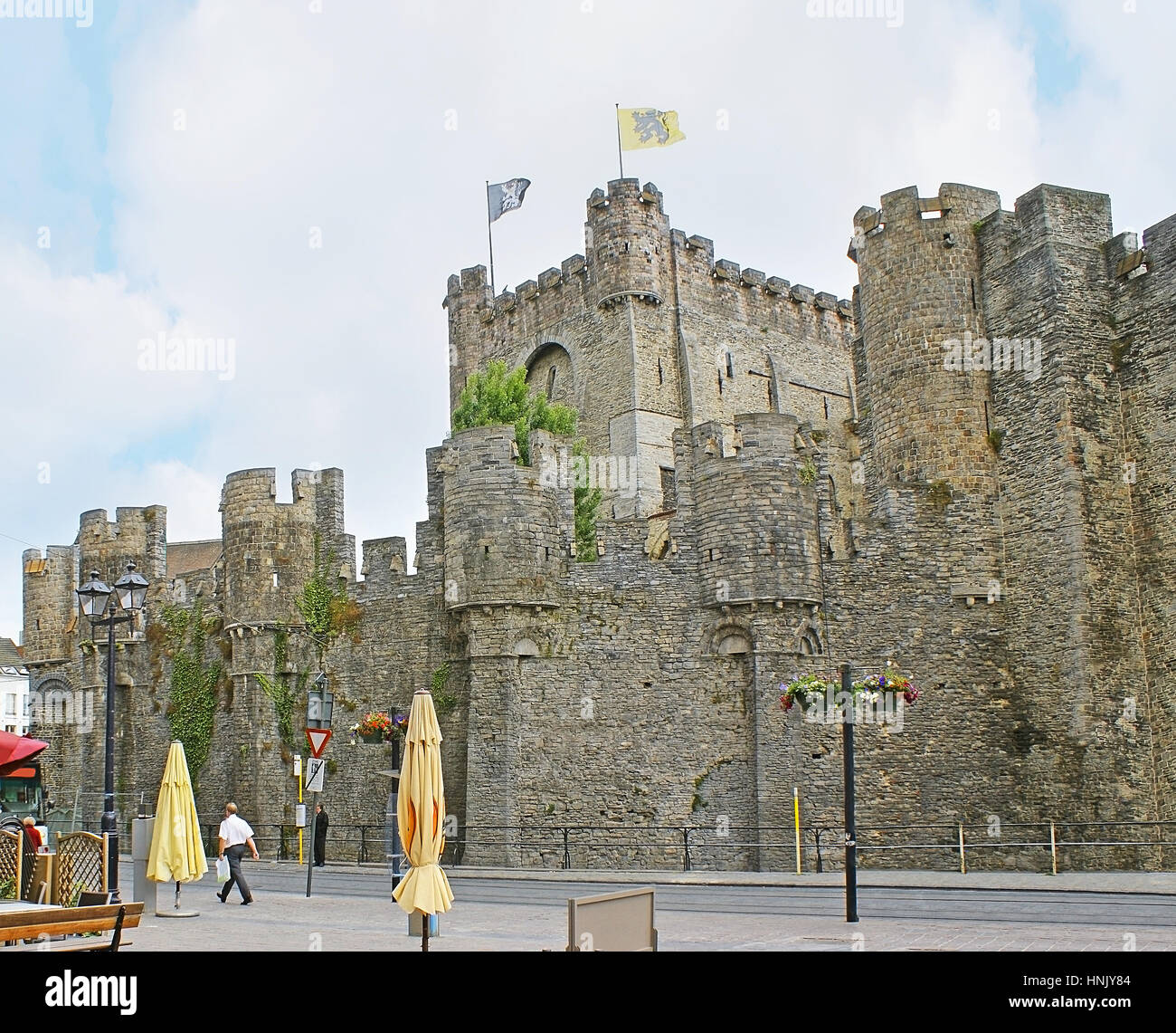 The huge stone walls of the medieval Gravensteen Castle, located in the ...
