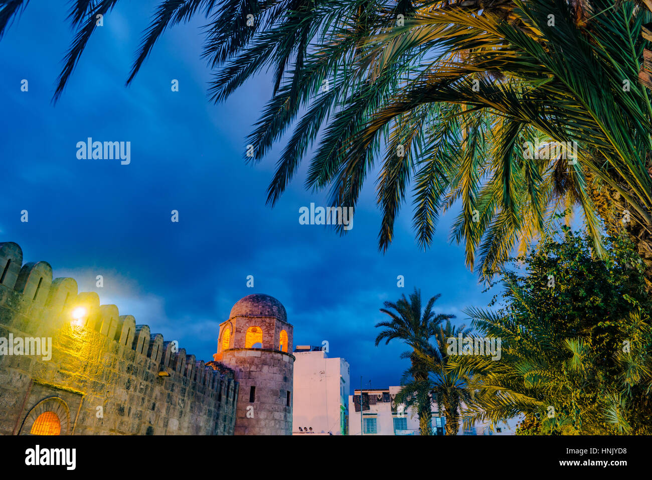 Night photo of Mosque in Sousse. Medieval architecture in night lights ...