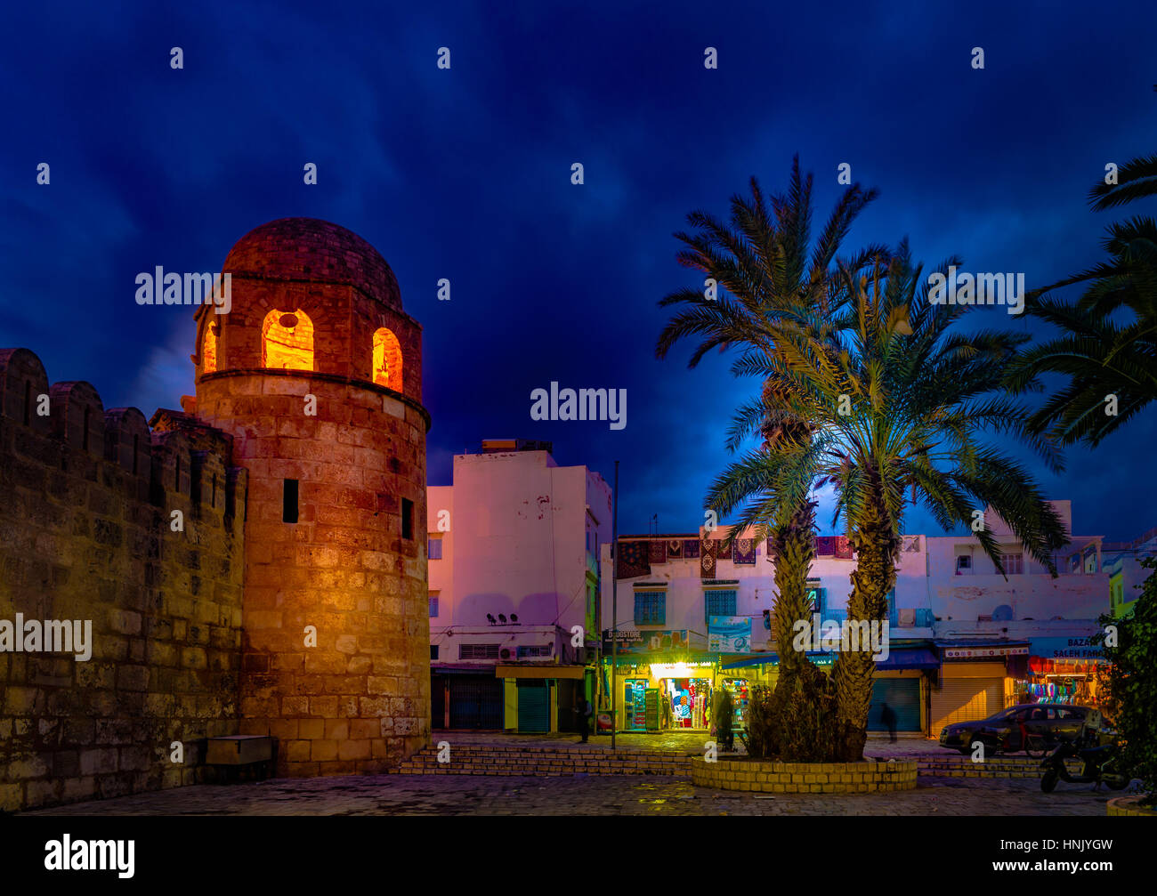 Night photo of Mosque in Sousse. Medieval architecture in night lights ...
