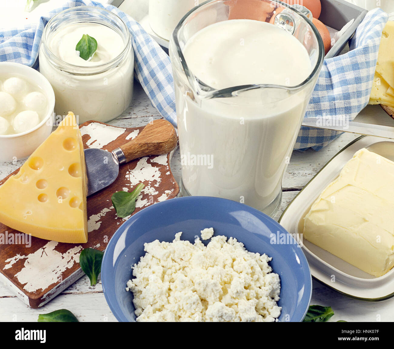Dairy products on a white wooden table Stock Photo - Alamy