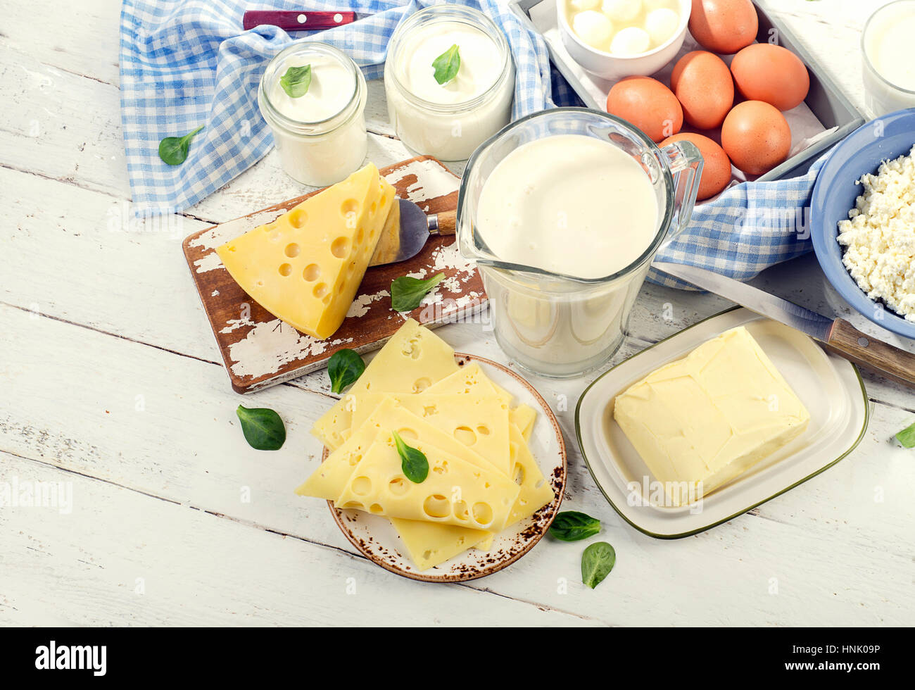 Set of fresh dairy products on a white wooden table. Top view Stock ...