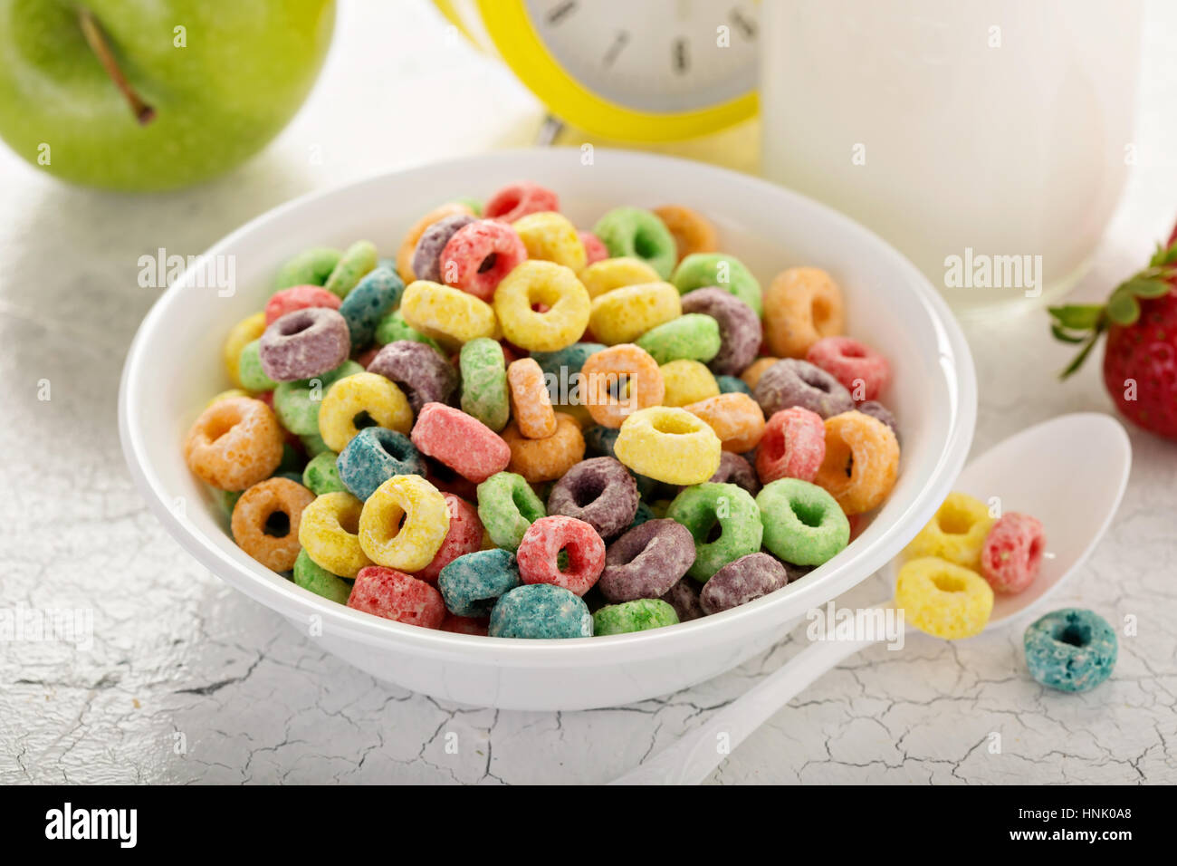 Fruit colorful sweet cereals in a bowl, traditional quick breakfast or ...