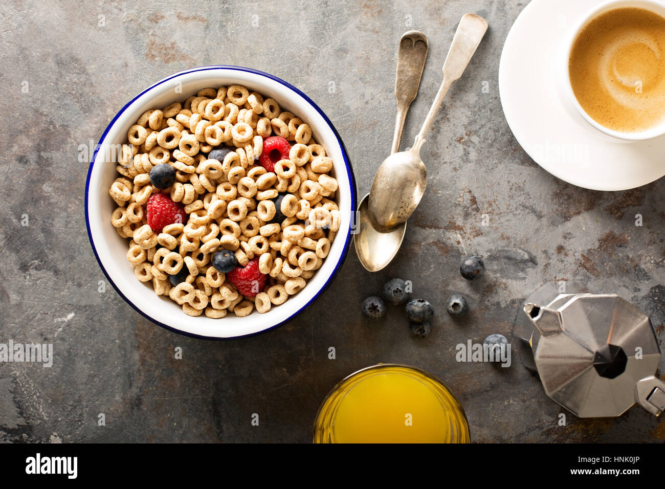 Healthy cold cereal with raspberry and blueberry in a bowl, quick ...