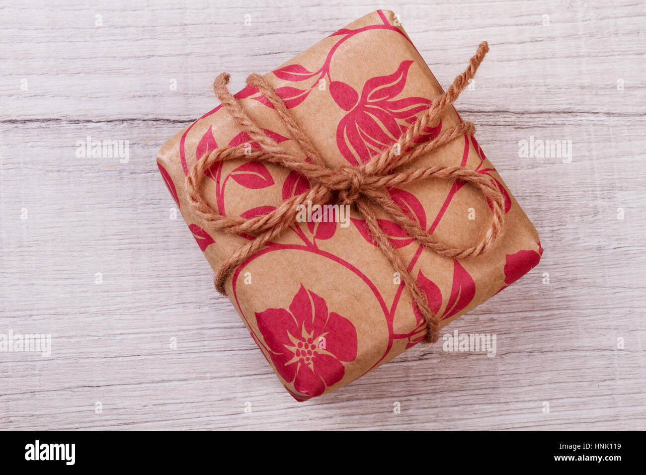 Gift box in wrapping hi-res stock photography and images - Alamy