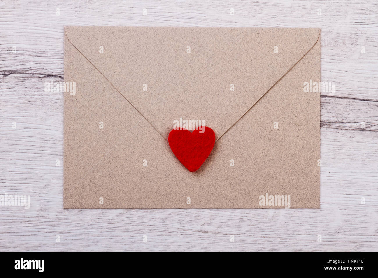 Envelope with red heart Stock Photo - Alamy