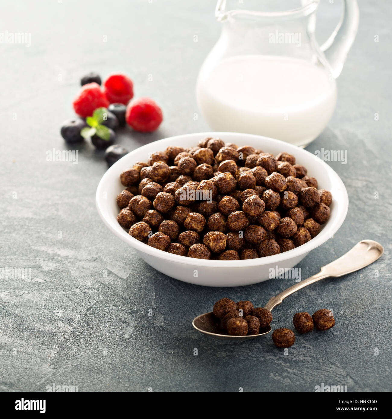 Chocolate sweet cold cereals in a white bowl Stock Photo - Alamy