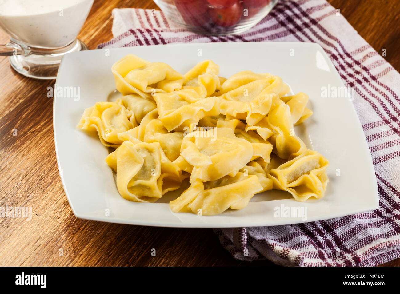Tortellini shells filled with chesse Stock Photo - Alamy