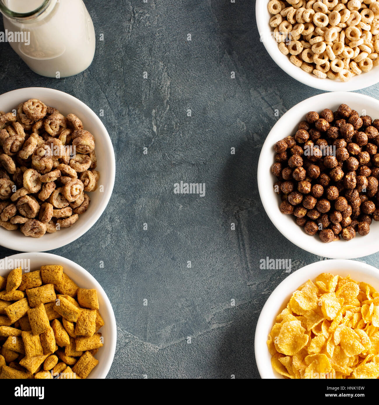Variety of cold cereals in white bowls, quick breakfast for kids ...