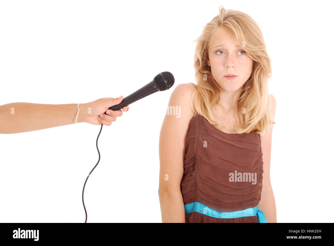 The teenage girl's interview isolated on white background Stock Photo ...