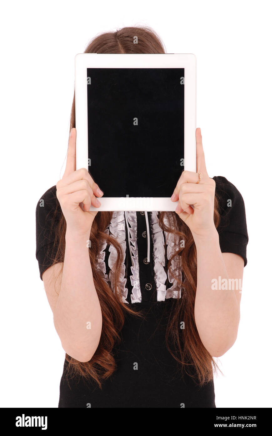 Girl keeps tablet pc in front of face isolated on white Stock Photo - Alamy