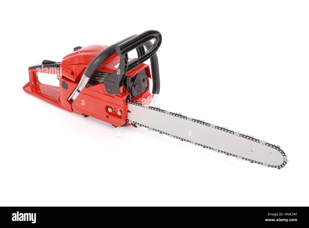 Red professional chainsaw isolated on white background Stock Photo - Alamy