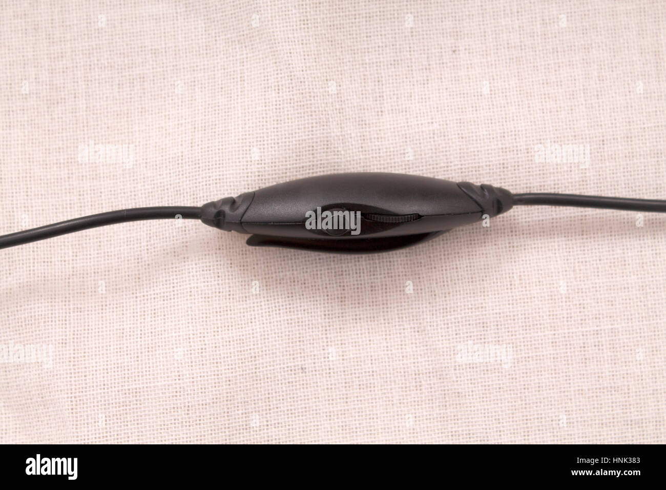 Control the volume of the headphones isolated on background Stock Photo ...