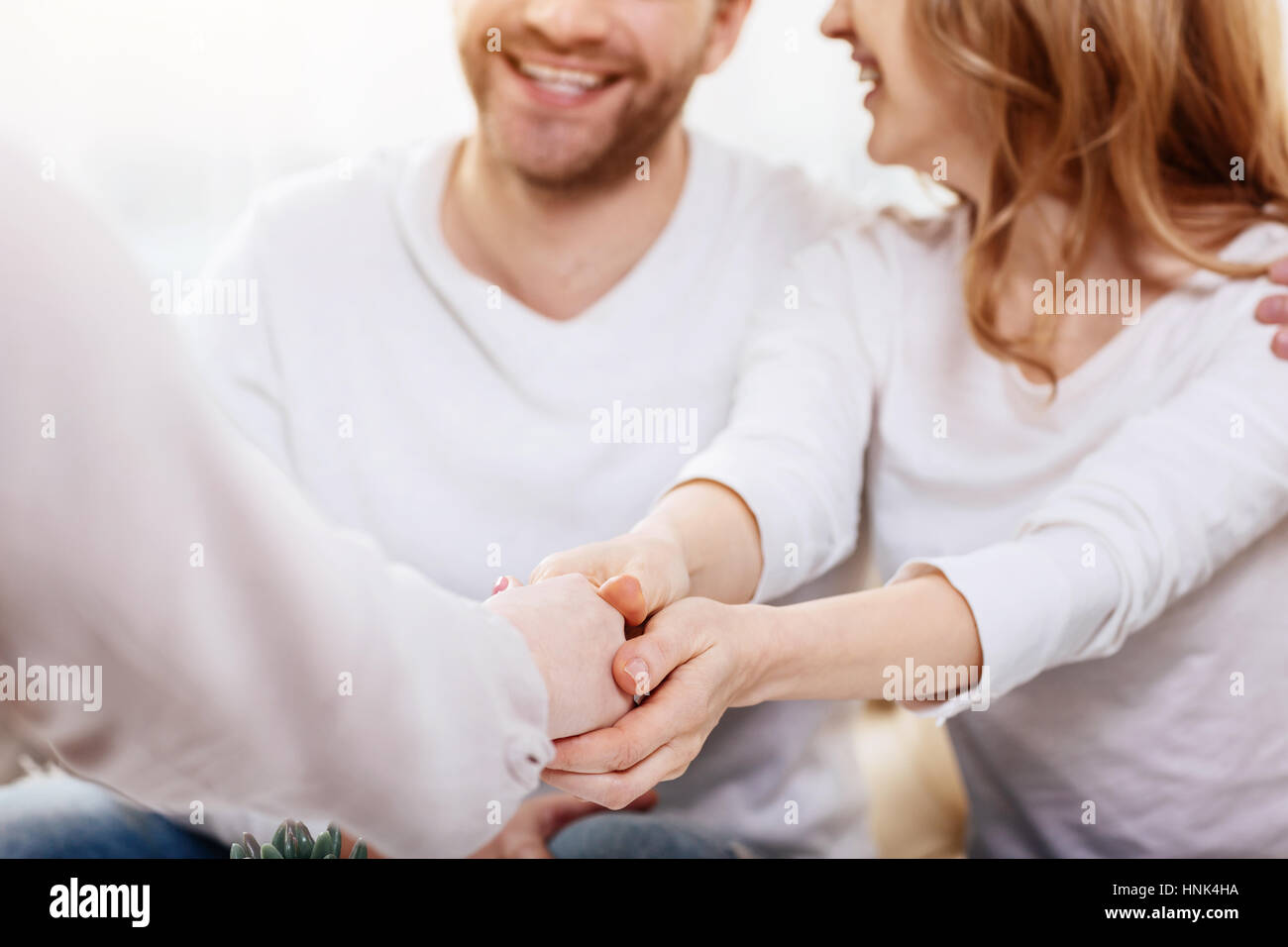 Close up of a handshake between two women Stock Photo - Alamy